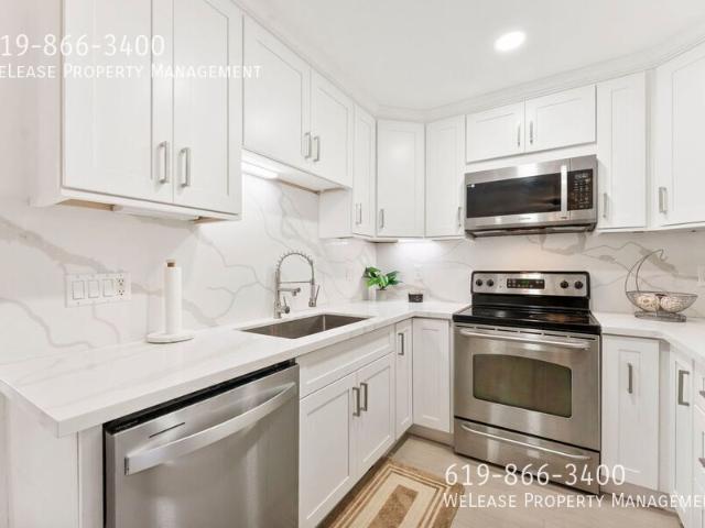 2 Bedroom, 2 Bathroom, sleek and modern unit within gated community!