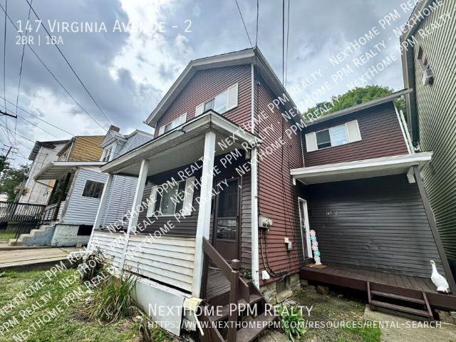 2 bedroom 2nd floor duplex with laundry in unit, covered porch and lawn access. September 1st