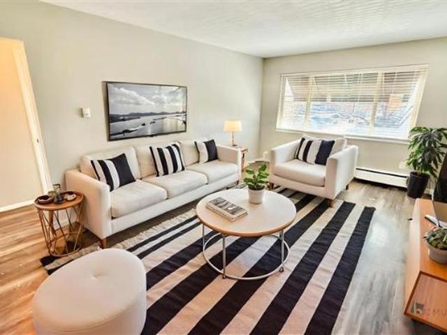 2 Br, 1 bath, Mid rise 2305 East Harvard Avenue