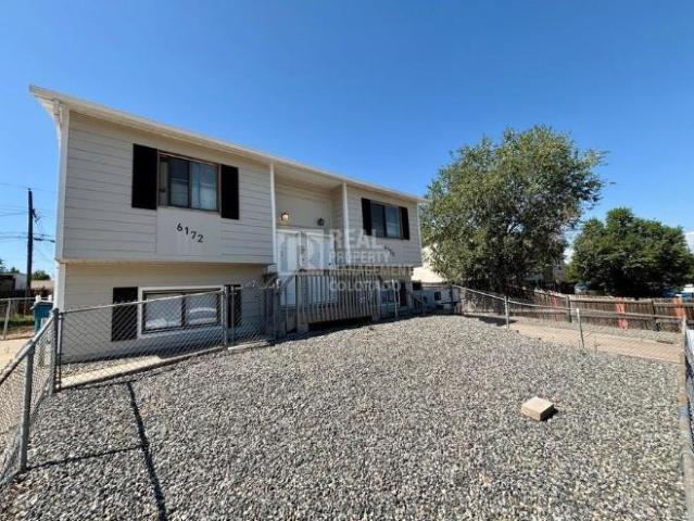 2 Br, 1 bath, Single Family 6172 E 64th Pl