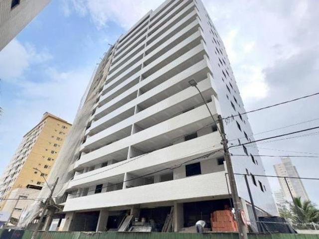 2 dormit sendo 2 suítes com ampla sacada gourmet e vista parcial para o mar