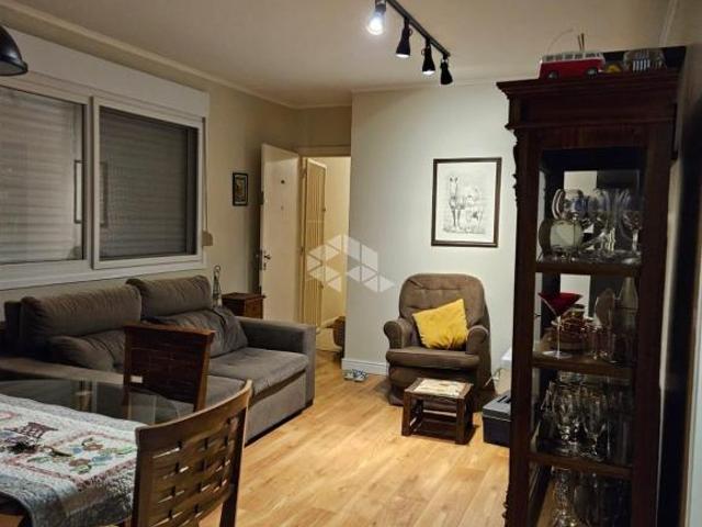 2 Dormitórios, Semimobiliado, elevador e vaga de garagem. R$ 285.000,00