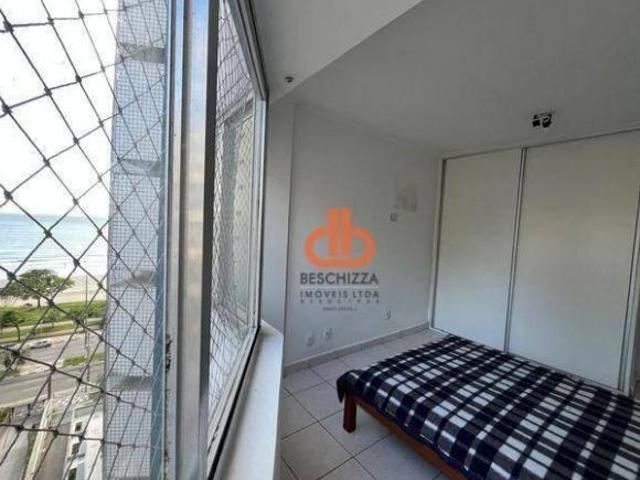 2 quartos, aparecida prédio frente a praia