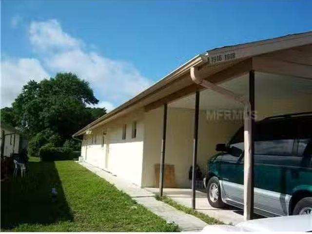 $2,000 Hurricane thermal windows 2/2 duplex, yard & carport.