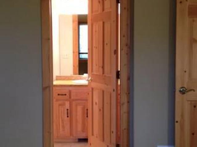 2br BEAUTIFUL NORTHWOODS LOG SIDED TWIN HOME, LOTS OF AMMENITIES for sale in Breezy Point, Minnesota