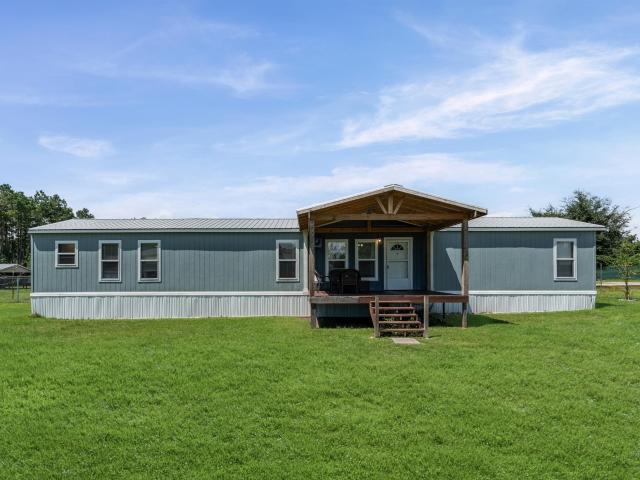 300 County Road 3554, Cleveland, TX 77327 | MLS #31331 | Compass
