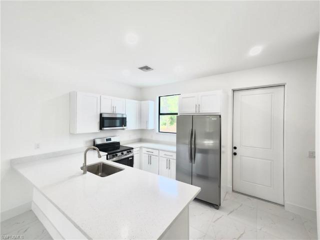 301 303 Norwalk Ave, Lehigh Acres, FL 33972 | MLS #226009 | Compass