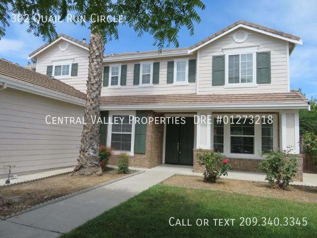 302 Quail Run Circle, Tracy!