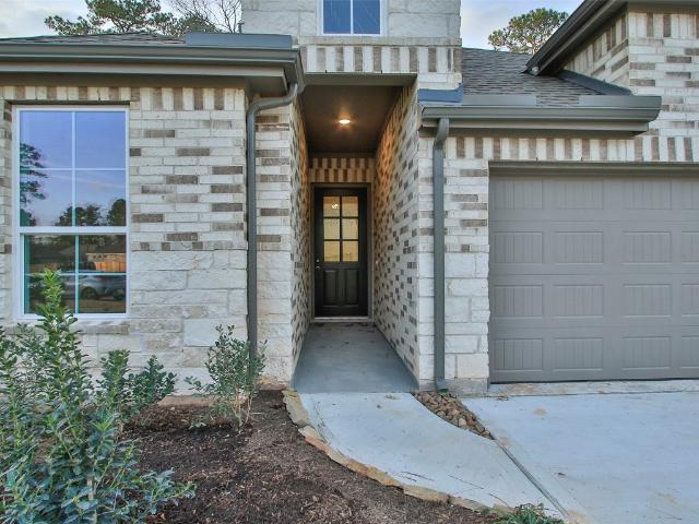 303 Landes Trl, Willis, TX 77318 | MLS #54950 | Compass