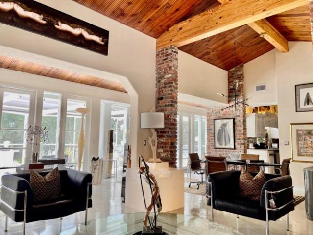 304 N Country Club Dr, Atlantis, FL 33462