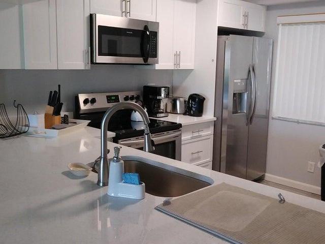 3050 Presidential Way, Unit 206, West Palm Beach, FL 33401 | MLS #R11144