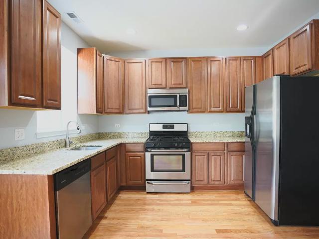3051 W Fullerton Ave, Unit 1, Chicago, IL 60647 | MLS #12608 | Compass