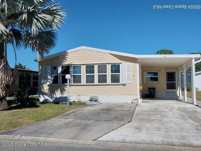 306 Papaya Cir, Barefoot Bay, FL 32976