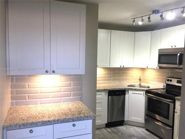 3075 NW 7th St, Unit 401, Miami, FL 33125 | MLS #A11644 | Compass