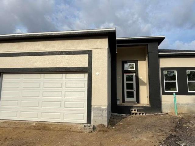 310 Millport St NW, Port Charlotte, FL 33948 | MLS #O6359 | Compass