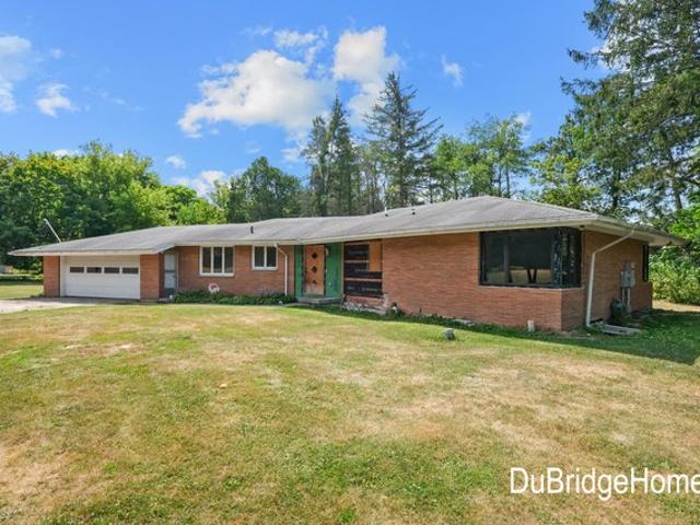 311 Honey Creek Ave SE, Ada, MI 49301