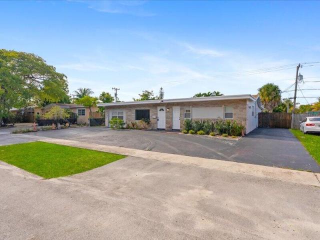 311 W Sample Rd, Deerfield Beach, FL 33064 | MLS #B26000 | Compass