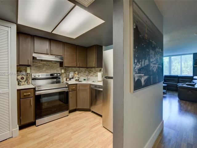 3149 Riverside Dr, Unit B202, Coral Springs, FL 33065 | MLS #A12012 | Compass