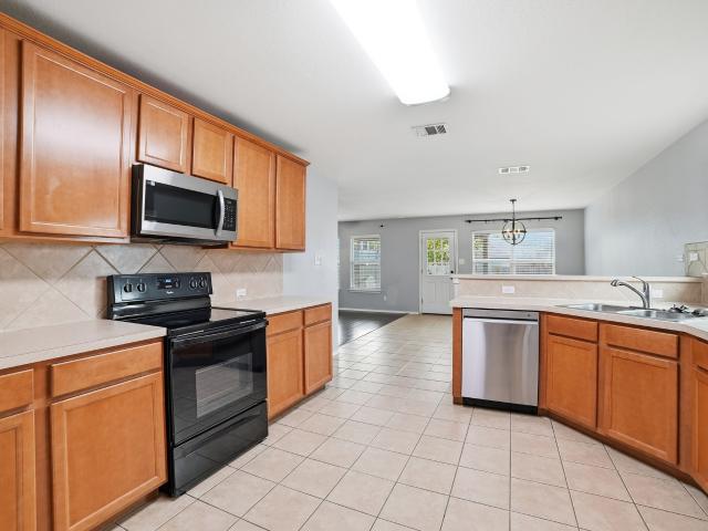 316 Housefinch Loop, Leander, TX 78641 | MLS #5475 | Compass