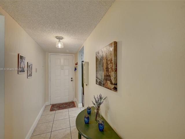 3186 Via Poinciana, Unit 203, Lake Worth, FL 33467 | MLS #A11858 | Compass