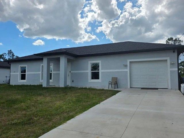 322 Mangonia Ave, Lehigh Acres, FL 33974