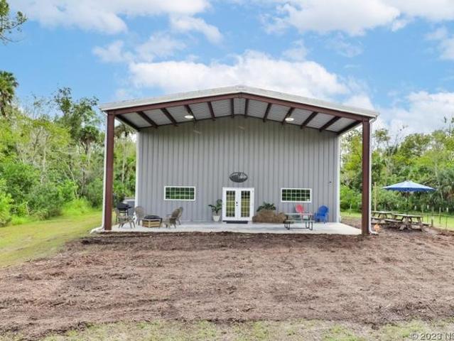 325 N Putnam Grove Rd, Oak Hill, FL 32759 in Oak Hill, Florida