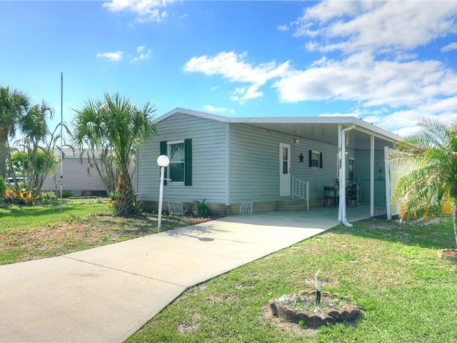 327 Loquat Dr, Barefoot Bay, FL 32976 | MLS #296673 | Compass