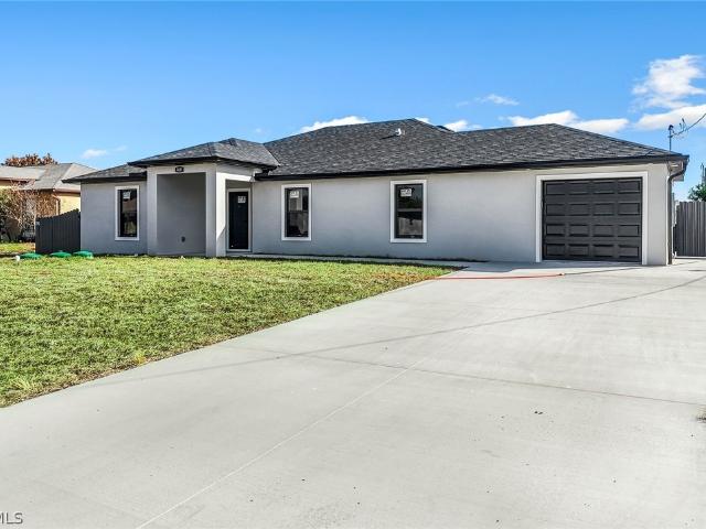3411 27th St SW, Lehigh Acres, FL 33976 | MLS #2026009 | Compass