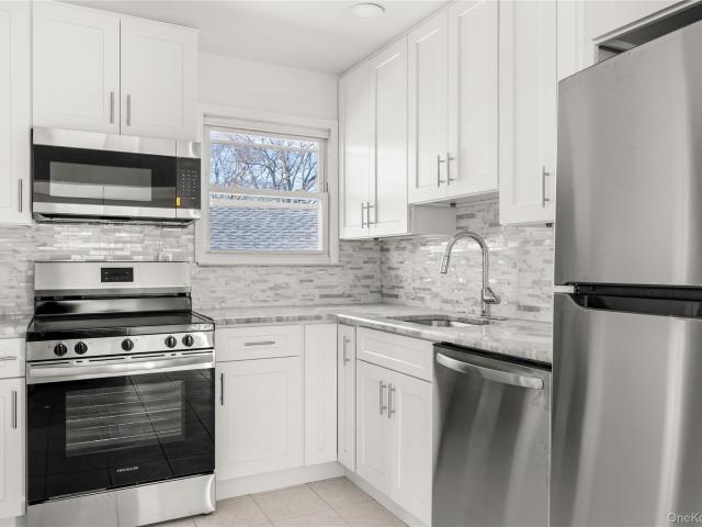 345 41st St, Copiague, NY 11726 | MLS #1001
