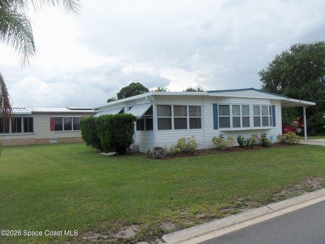 346 Egret Cir, Barefoot Bay, FL 32976