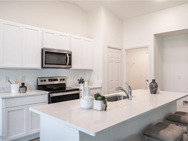 3518 21st St SW, Lehigh Acres, FL 33976 | MLS #2026005 | Compass