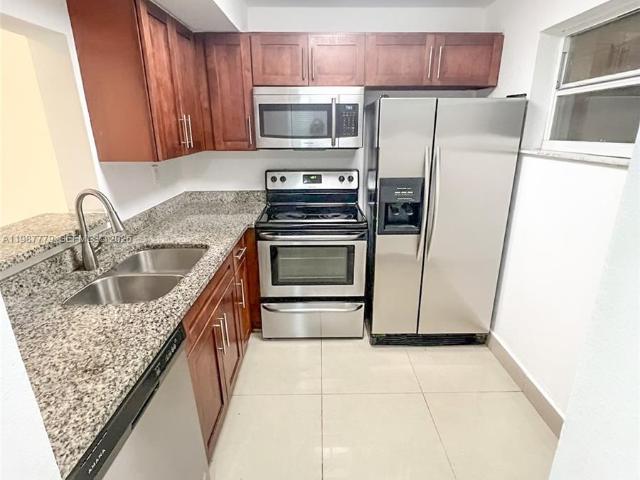 3610 NW 21st St, Unit 104, Lauderdale Lakes, FL 33311 | MLS #A11987 | Compass