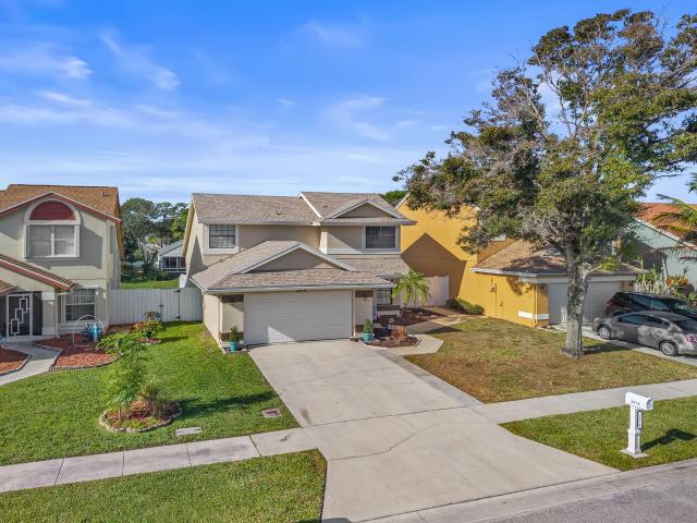 3874 Circle Lake Dr, West Palm Beach, FL 33417 | MLS #B26001 | Compass