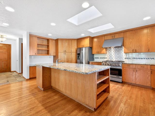 387 NE 15TH CT
