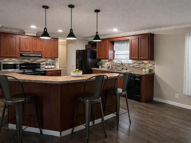 390 NW 134th Ave, Plantation, FL 33325 | MLS #A12008 | Compass