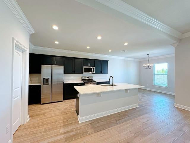 3 Bedroom House located off Burbank that sits on the Community Lake