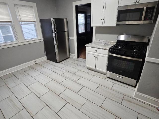 3 Br, 1 bath, Condo 4280 E 124th