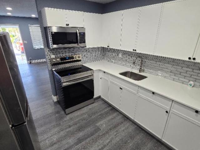 3 Br, 1 bath, Condo 5802 Nw 12th St