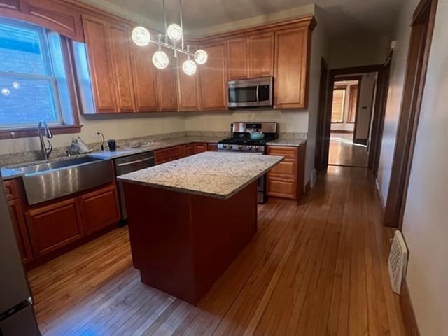 3 BR, 1 BA Apartment 1111 North Spaulding Avenue, Unit 1, Chicago, IL 60651