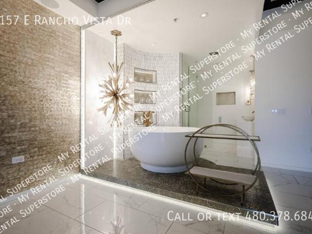 3 Br, 2 bath, Single Family 7157 E Rancho Vista Dr