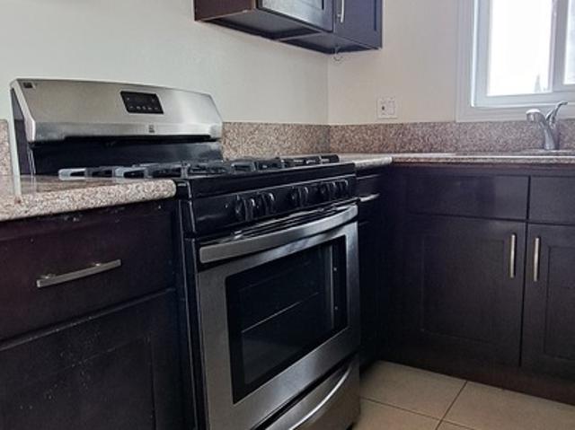 3 BR, 2 BA Apartment 1340 West 85th Street, Unit D, Los Angeles, CA 90044