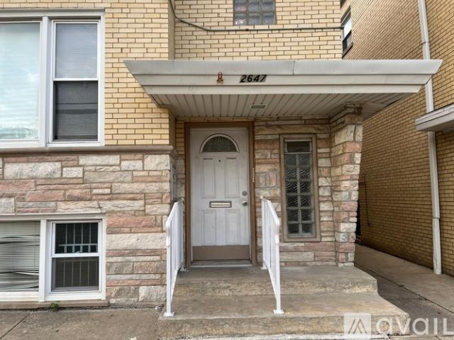 3 BR, 2 BA Apartment 2647 W 71st St, Unit 1, Chicago, IL 60629