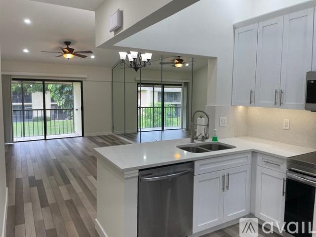 3 BR, 2 BA Apartment 3939 Northeast 5th Avenue, Unit C201, Boca Raton, FL 33431
