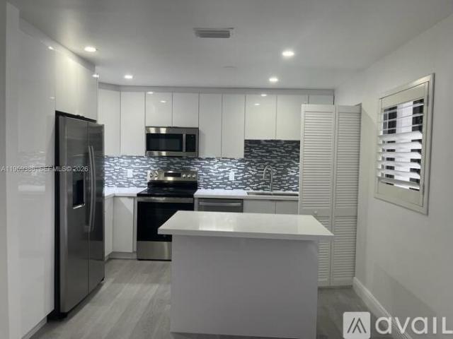 3 BR, 2 BA Apartment 6004 NW 38th St, Virginia Gardens, FL 33166