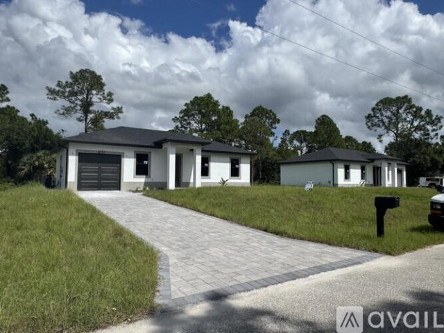 3 BR, 3 BA Apartment 1125 Chipley St, Lehigh Acres, FL 33974