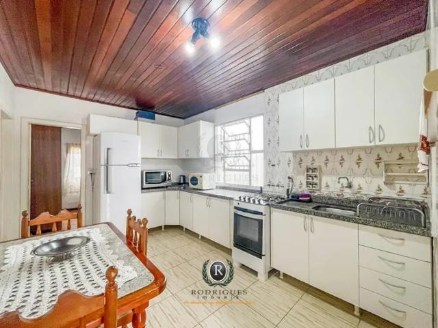 3 casas no mesmo pátio venda Centro Torres