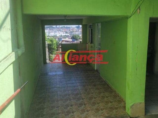 3 casas com duas vagas de garagem