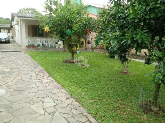 3 casas escrituradas em um terreno à venda no bairro Belém Novo