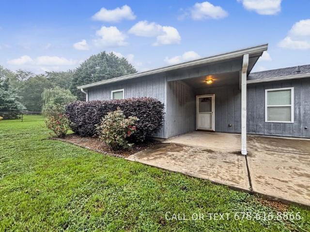 3BR/1BA Triplex Home in Loganville – Bonus Room, Separate Driveway & Storage Shed