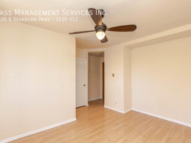 Take a 3D Tour and See a Unit Video Included Below! Charming Gold Coast Studio Separate Kitchen, Top Floor, Minutes From the Lake!
